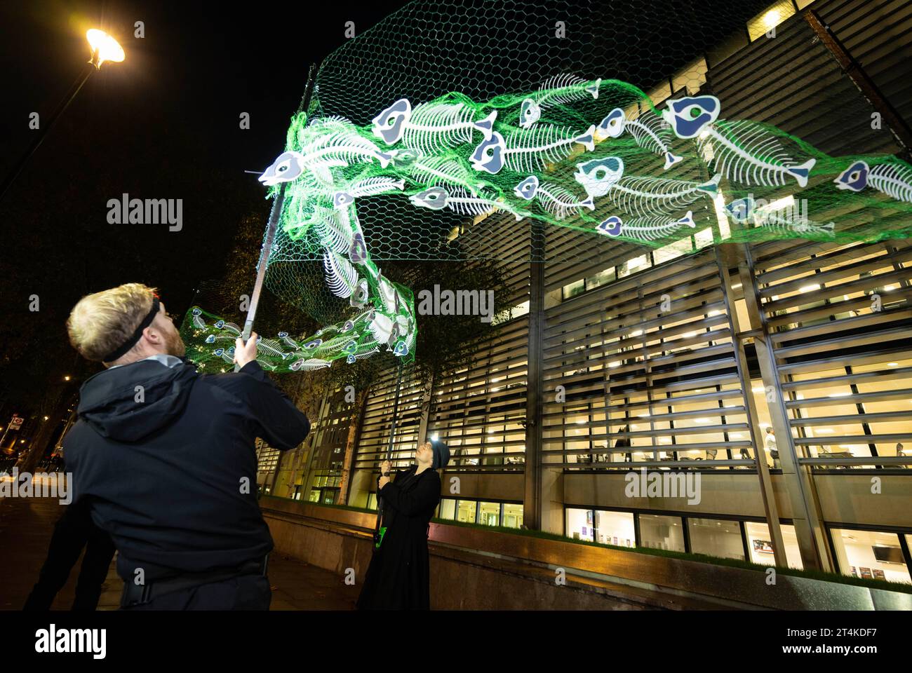 EDITORIAL USE ONLY Representatives from Oceana UK protest outside the ...