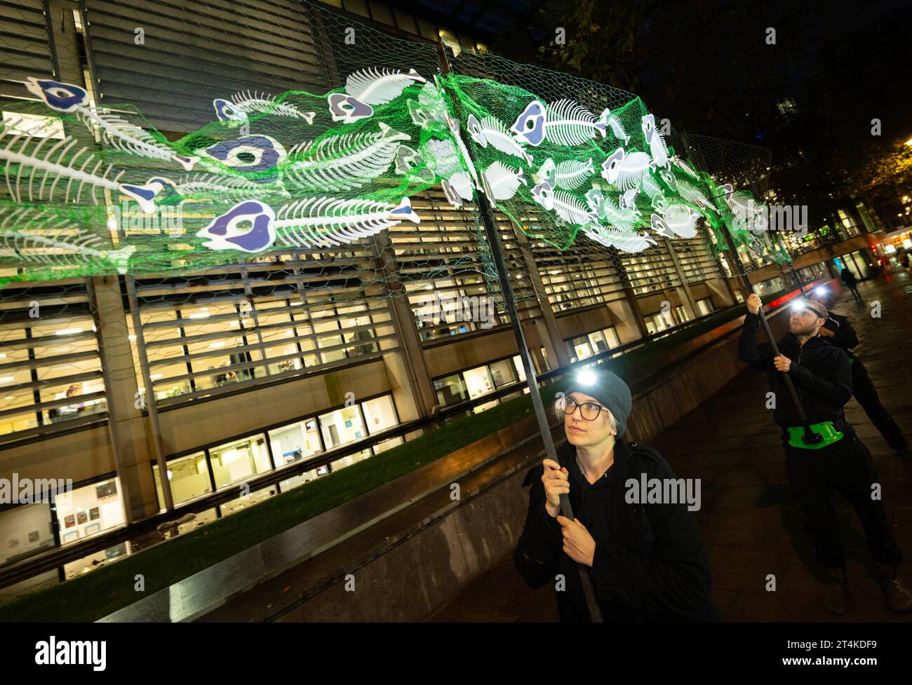 EDITORIAL USE ONLY Representatives from Oceana UK protest outside the ...