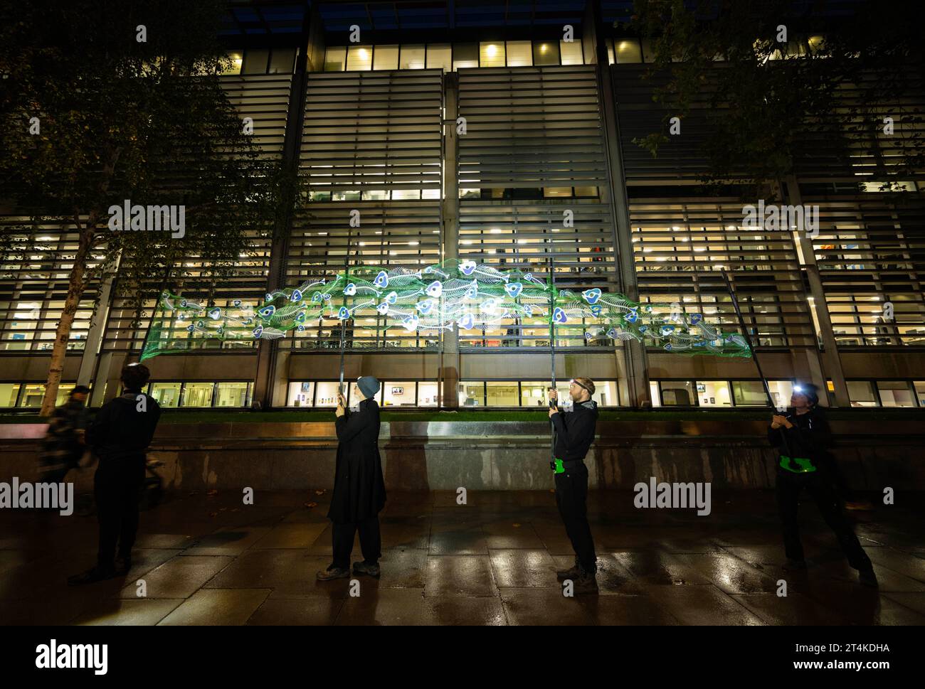 EDITORIAL USE ONLY Representatives from Oceana UK protest outside the ...