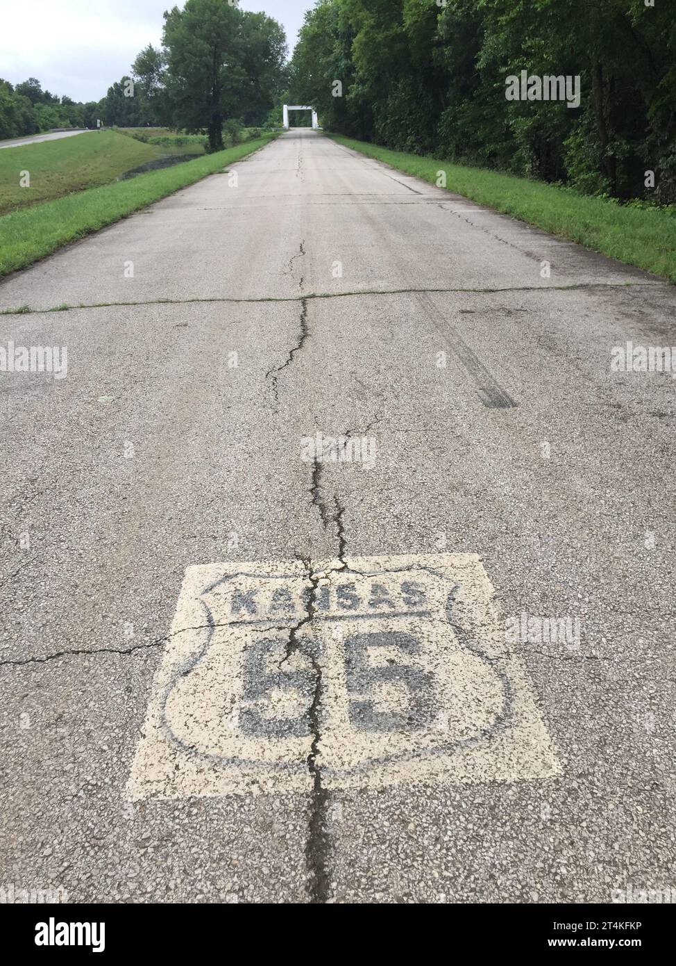 This vintage street sign is weathered and cracked, isolated in the ...