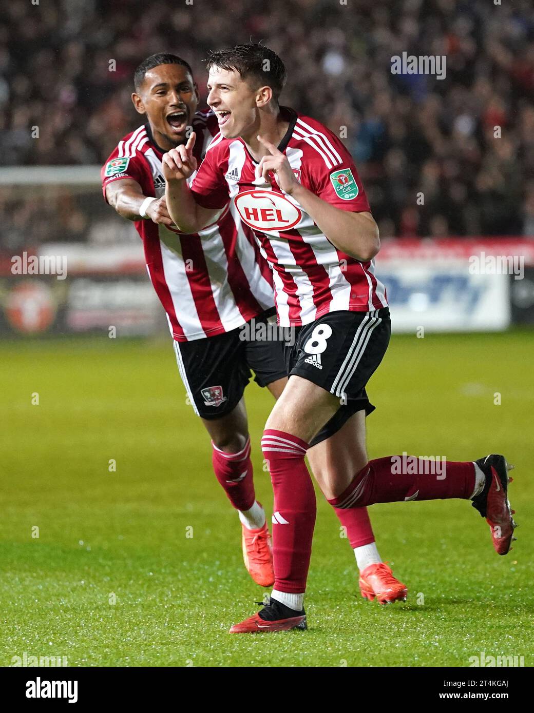 Exeter City's Ryan Trevitt (right) celebrates scoring their side's ...