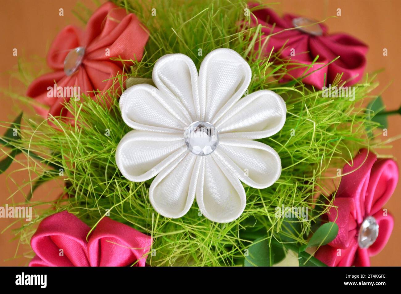 Handmade fabric flower. Hobby and craft concept. Artificial floral ...