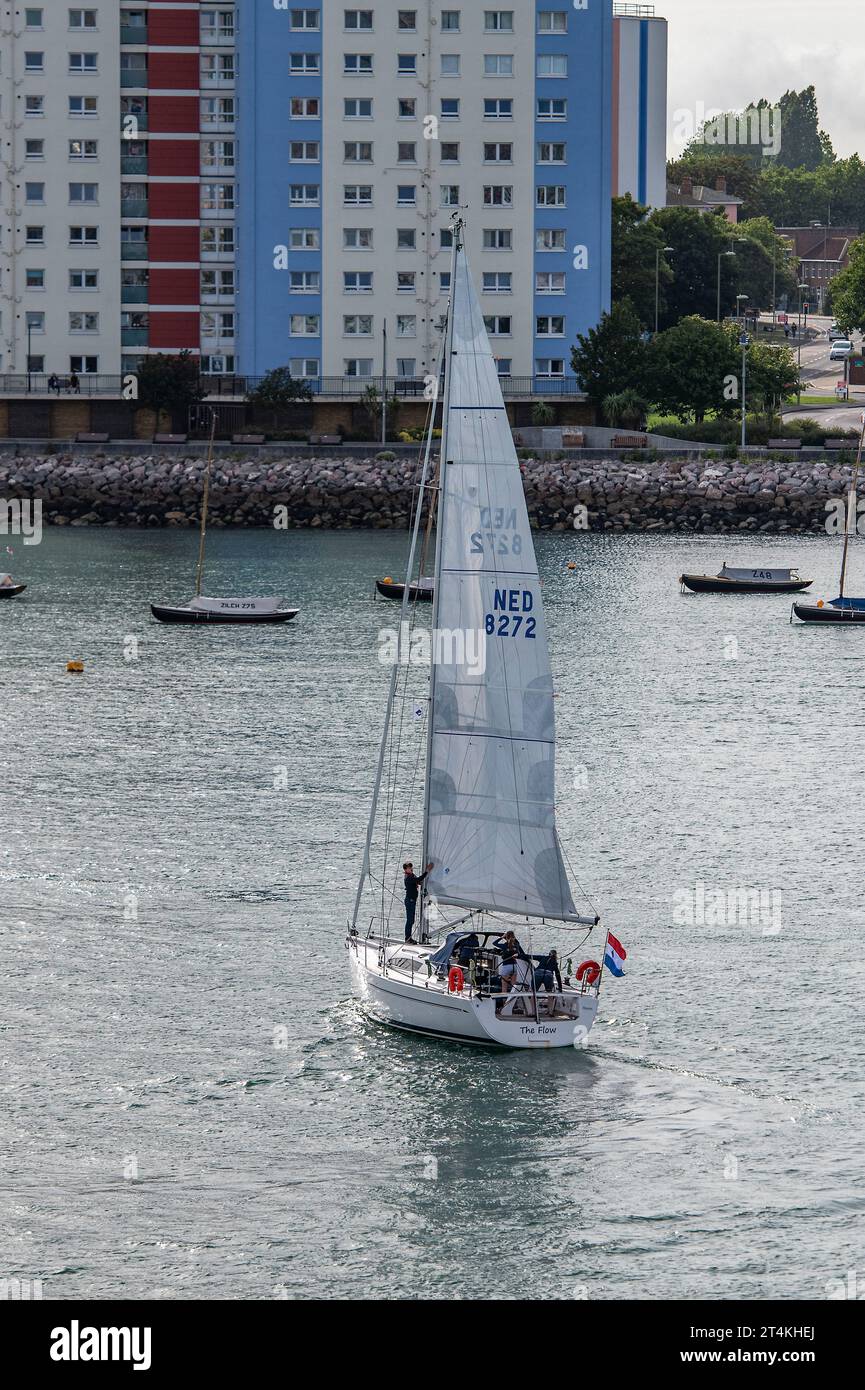 dutch sailors on a yacht entering portsmouth harbour in the uk. large ...