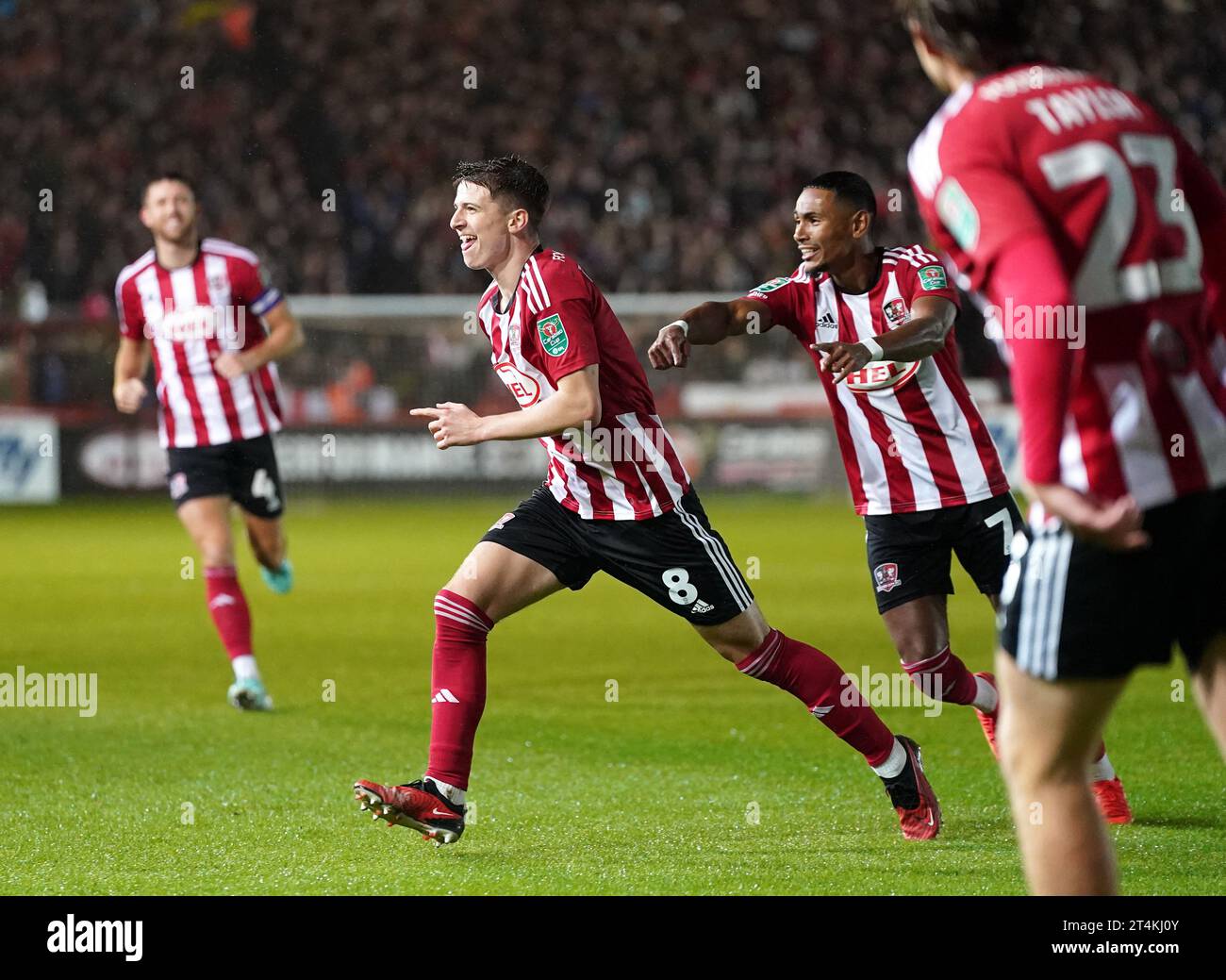 Exeter City's Ryan Trevitt celebrates scoring their side's first goal ...