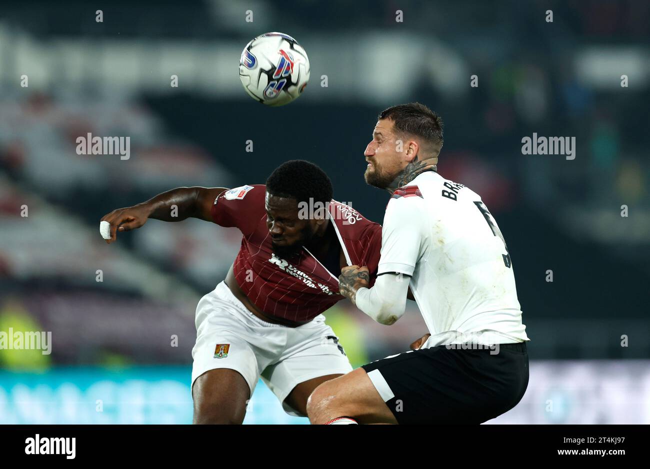 Northampton Town's Tyreece Simpson (left) and Derby County's Sonny ...