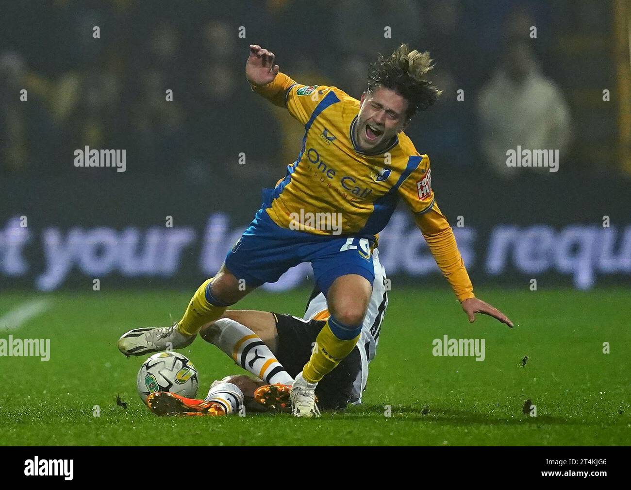 Port Vale's Jason Lowe challenges Mansfield Town's Will Swan during the ...