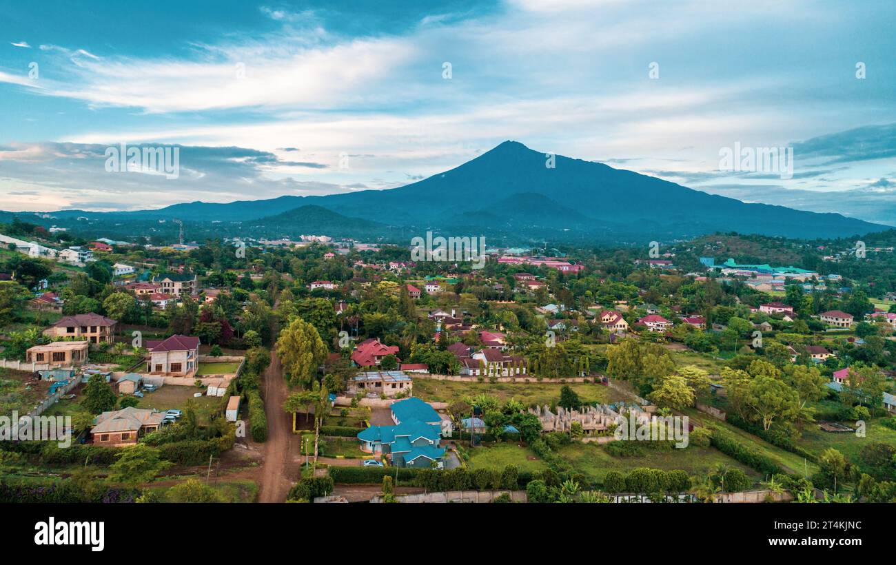 An aerial shot of a picturesque village situated on the side of a ...