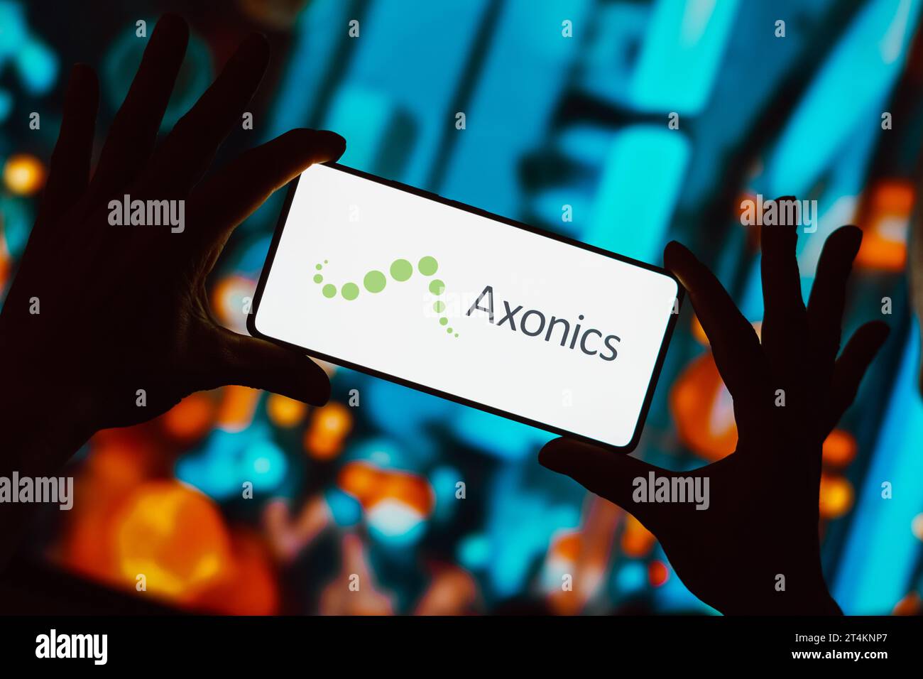 In this photo illustration, the Axonics Modulation Technologies logo is displayed on a ...