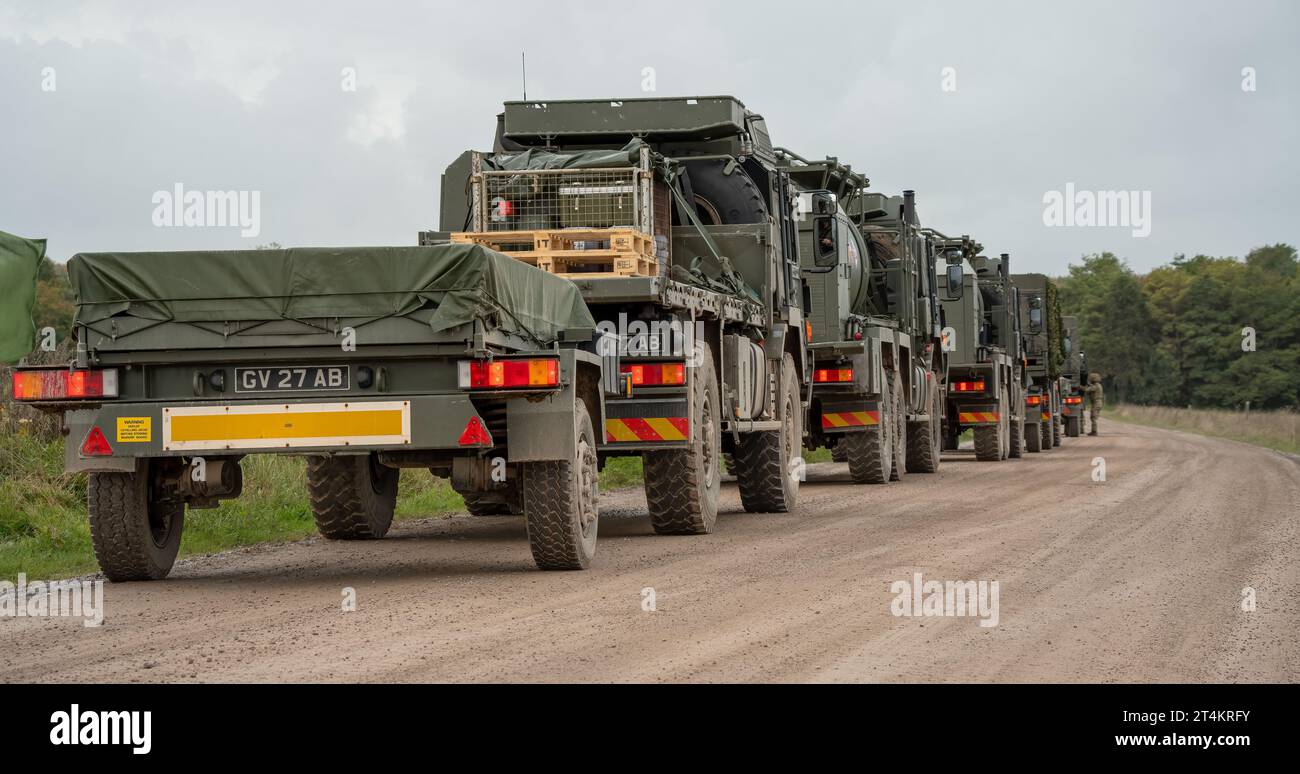 small convoy of British army M.A.N. HX58 unit support tankers and SV4x4 ...