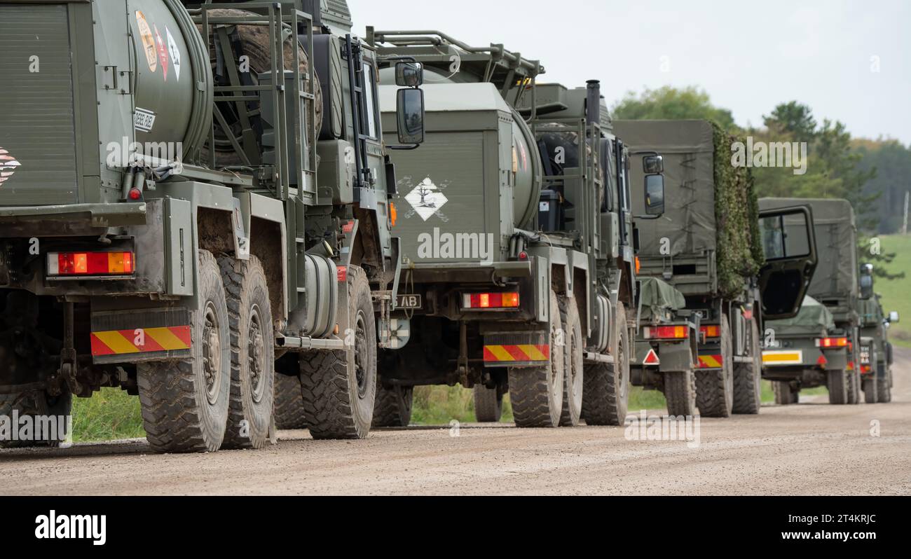 small convoy of British army M.A.N. HX58 unit support tankers and SV4x4 ...