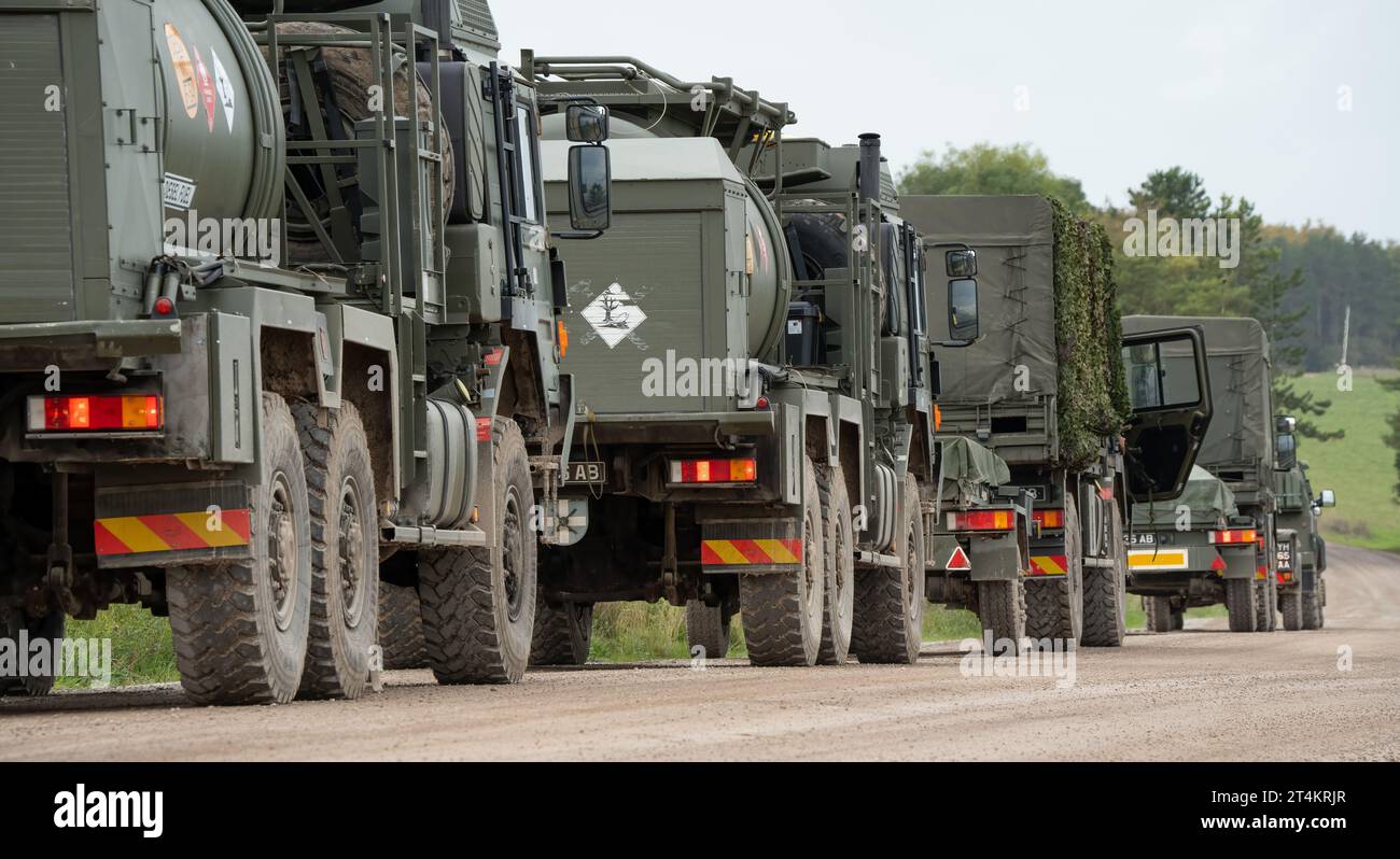 small convoy of British army M.A.N. HX58 unit support tankers and SV4x4 ...