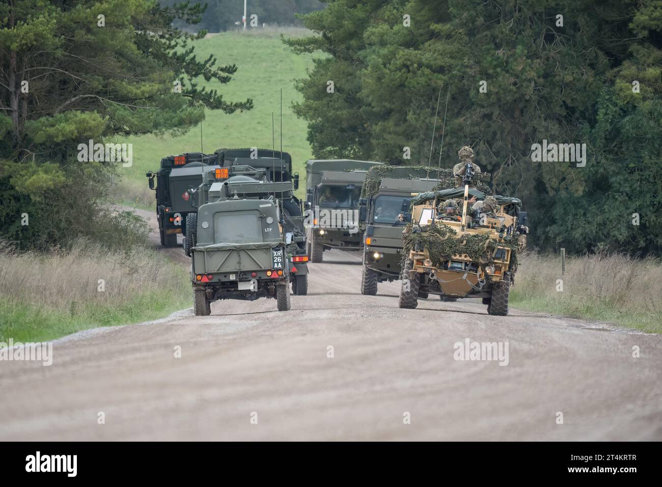 two British army convoys passing on a dirt road Stock Photo - Alamy