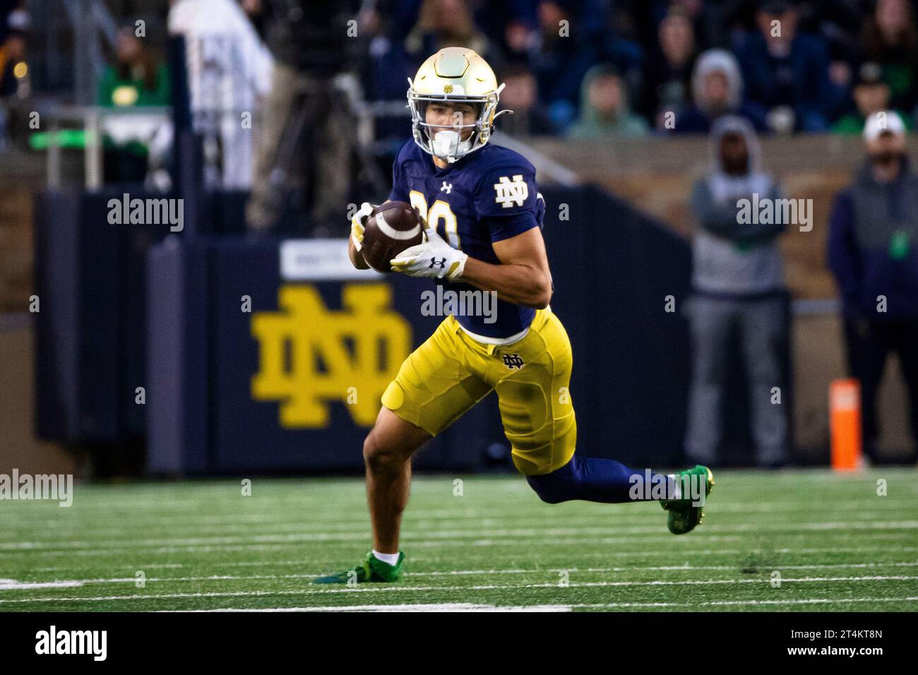 Notre Dame wide receiver Jordan Faison (80) runs the ball during the ...