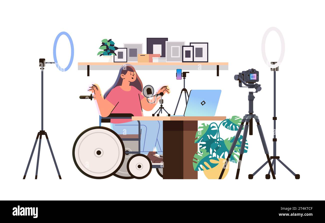 disabled woman blogger in wheelchair recording video on camera live ...