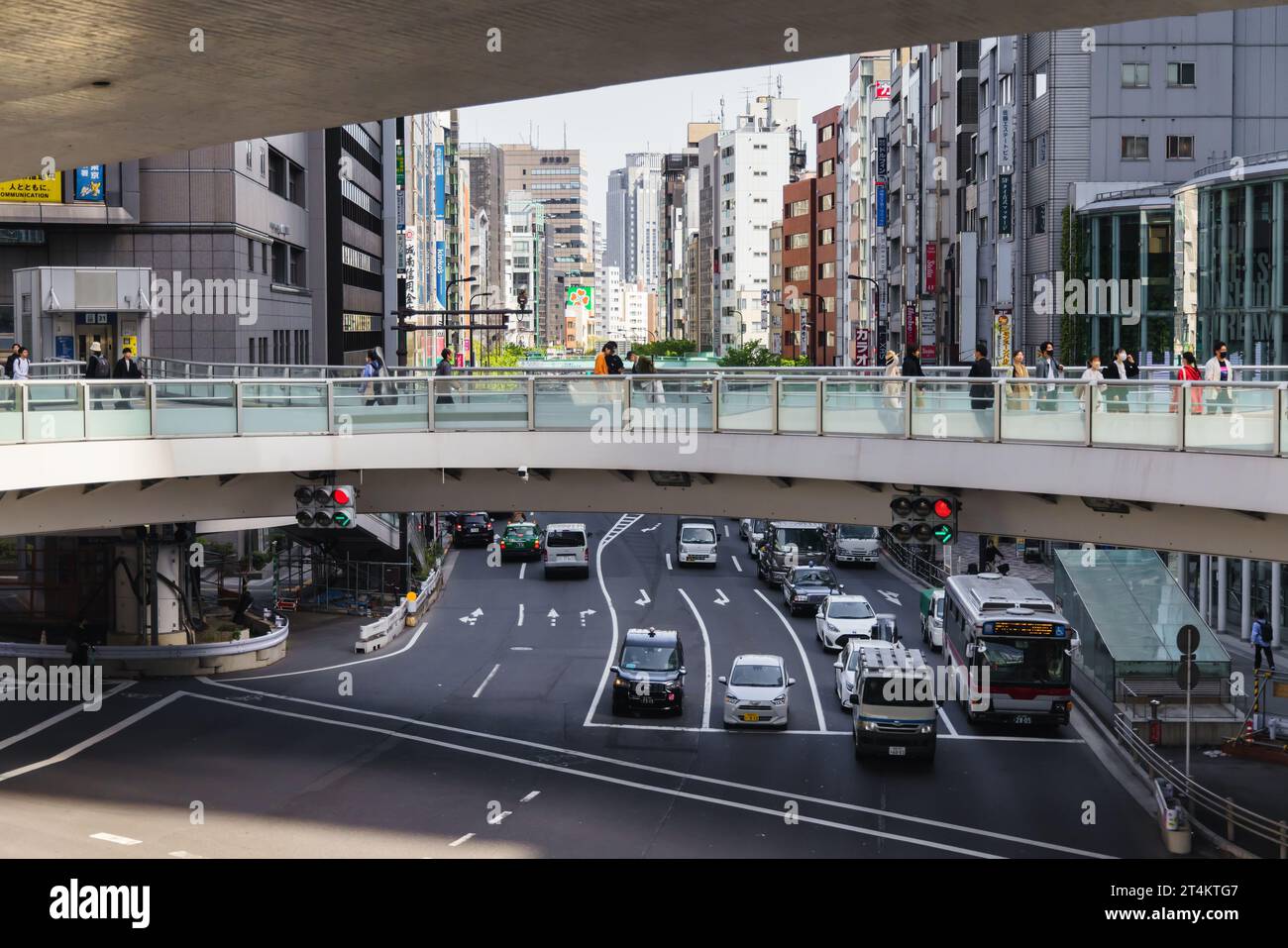 Tokyo, Japan - April 11, 2023: intersection with pedestrian overpasses ...