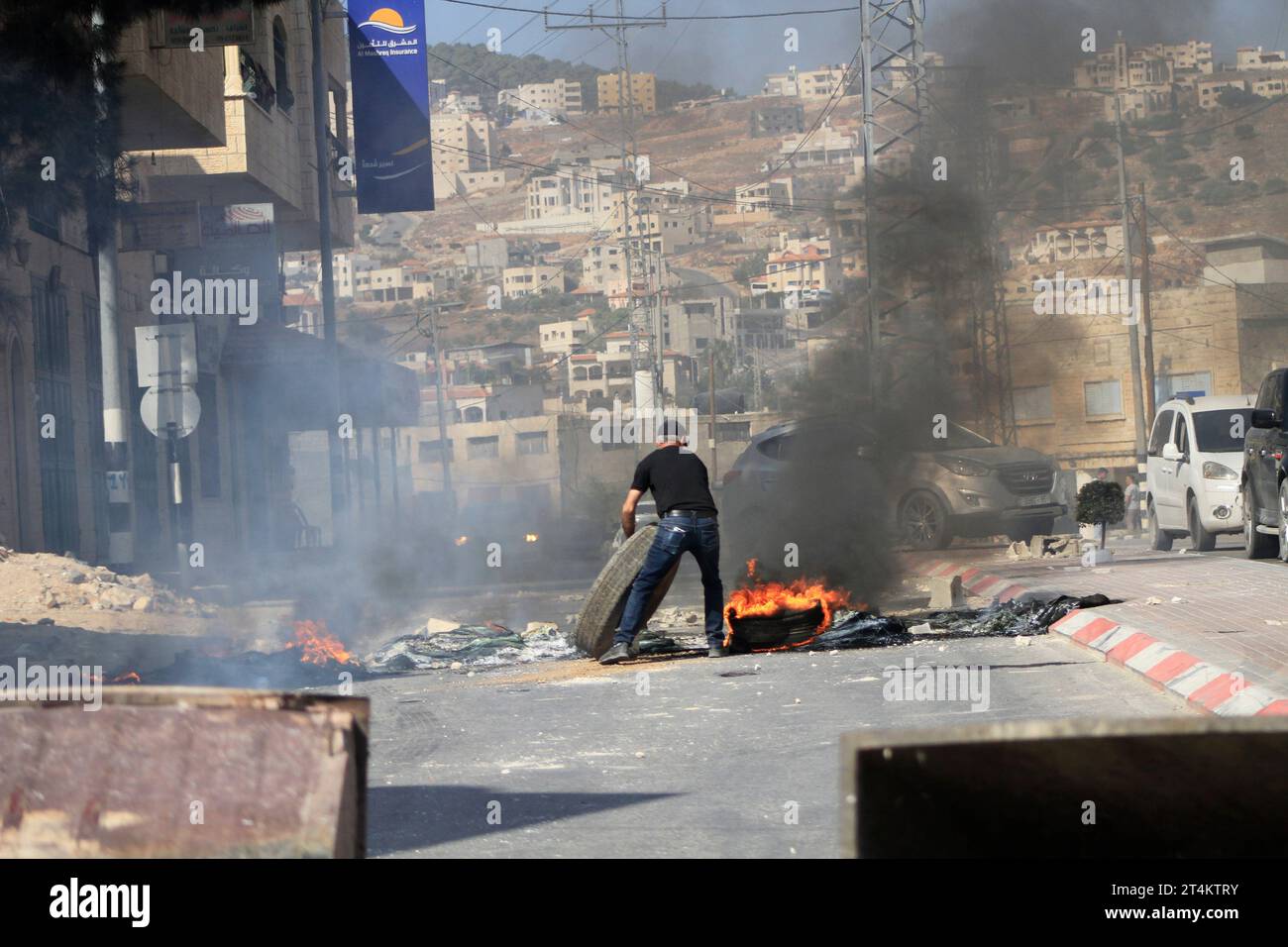 Tubas, Palestine. 31st Oct, 2023. A Palestinian seen burning tires to ...