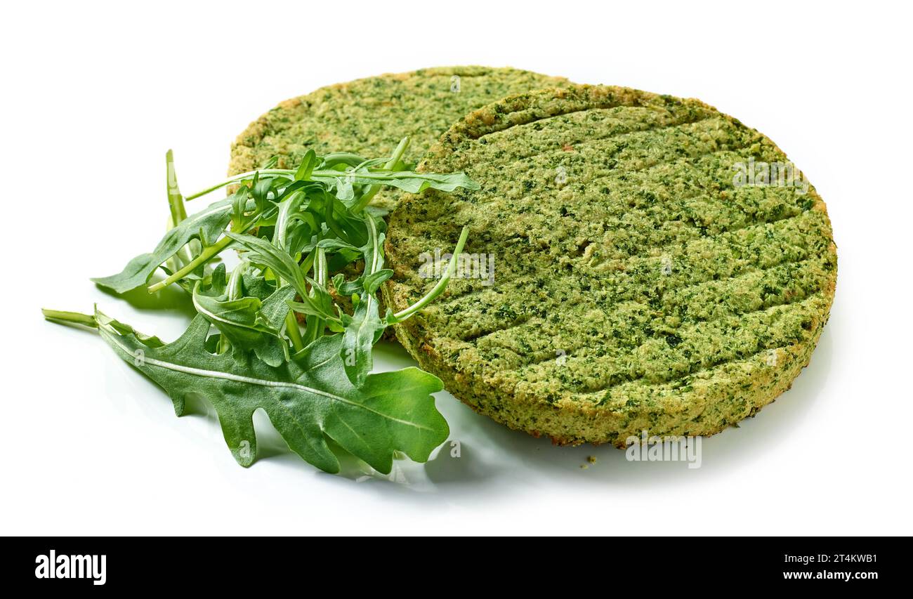 baked plant based burger patty decorated with arugula leaves isolated ...