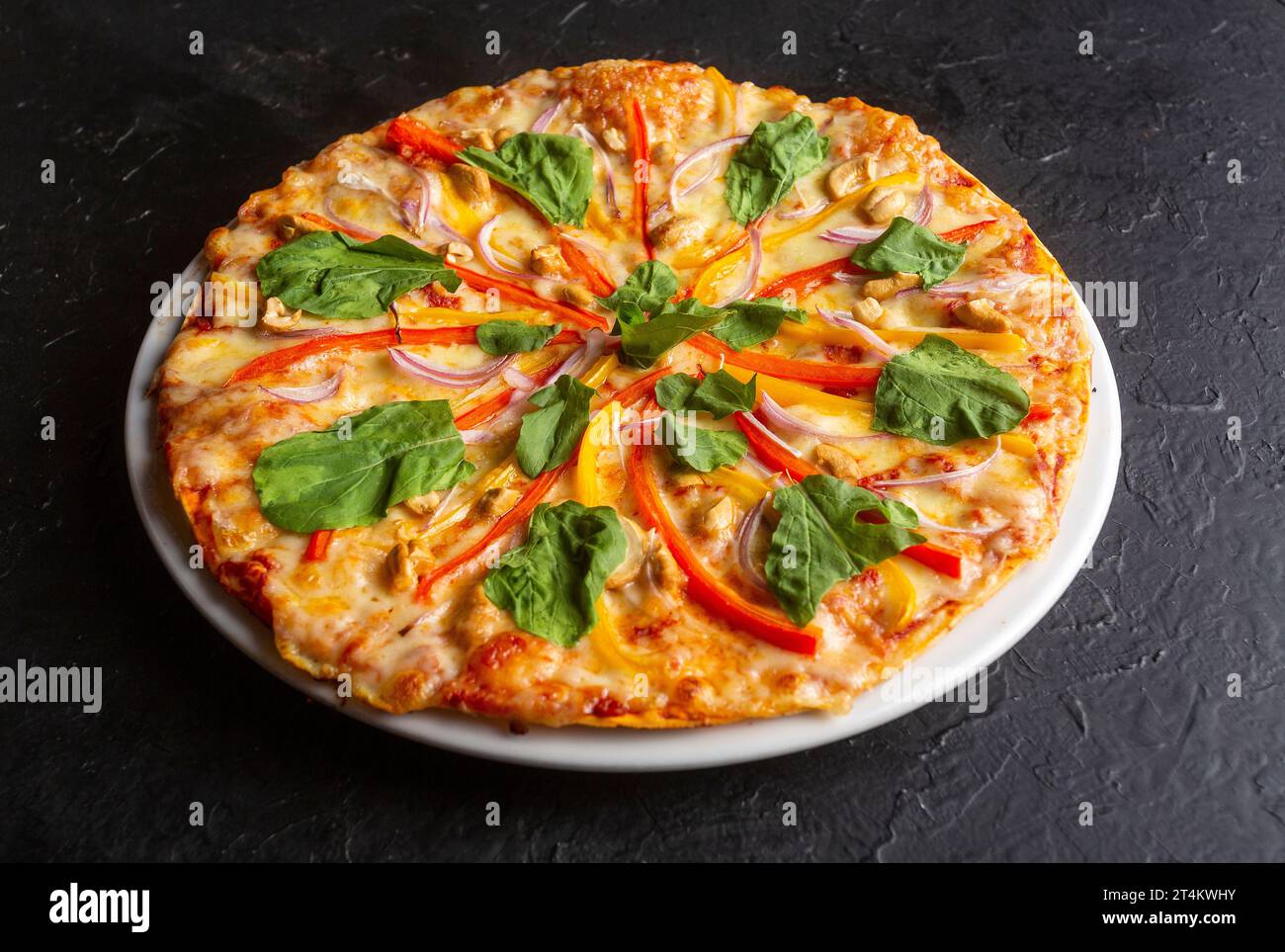 Vegetable pizza - Neapolitan sauce and cheese base Stock Photo - Alamy