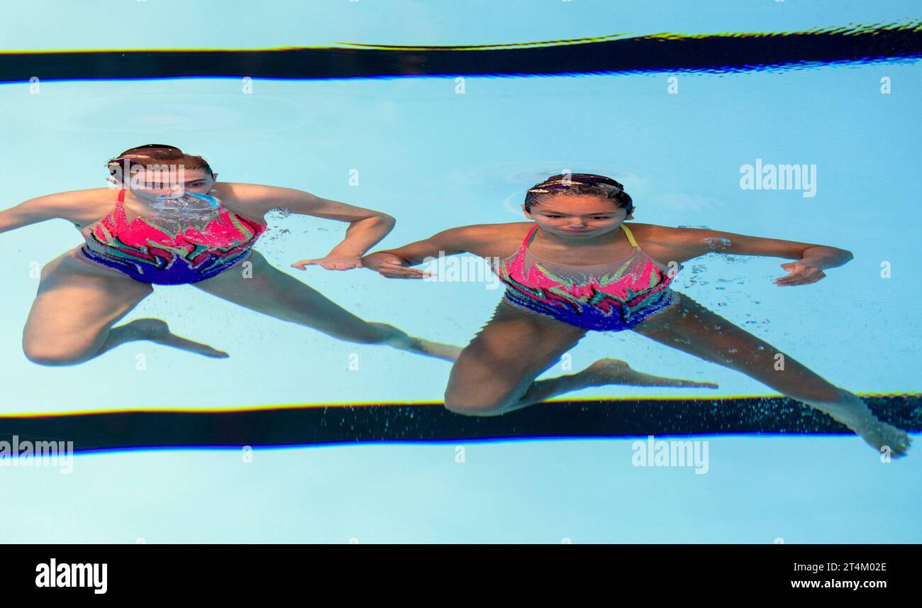 Uruguay's Lucia Ververis, left, and Augustina Medina rise to the ...