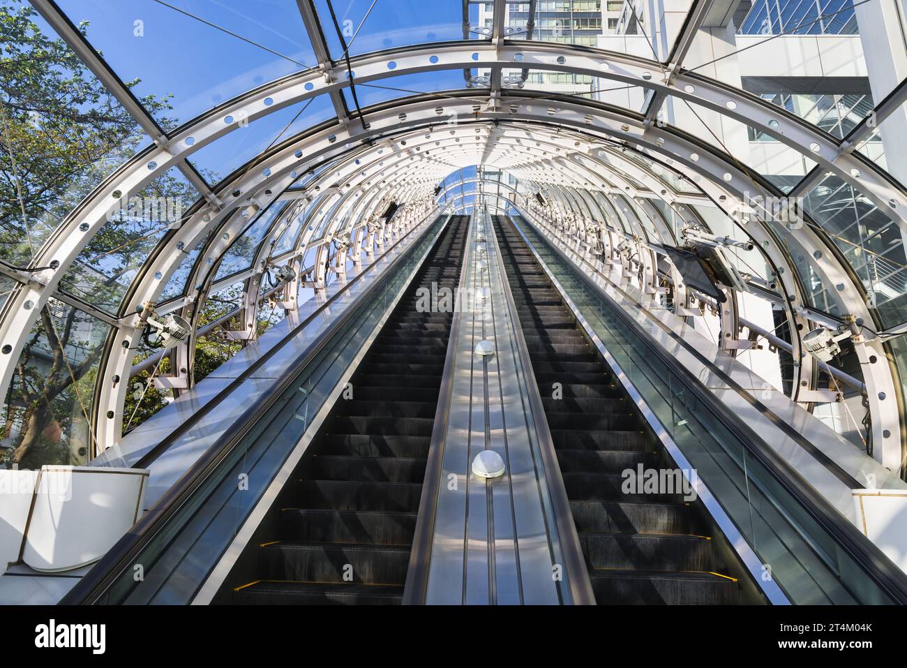 Tokyo, Japan - April 10, 2023: roofed escalator of the headquarter ...