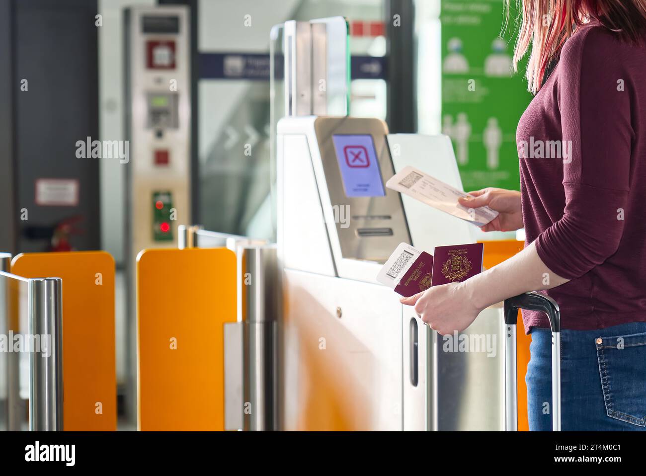 Passenger Safely Checking Passport at Automated Gate at the Airport ...