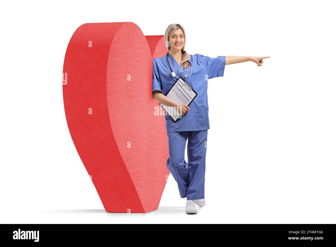 Full length portrait of a female cardiologist gesturing pointing and ...