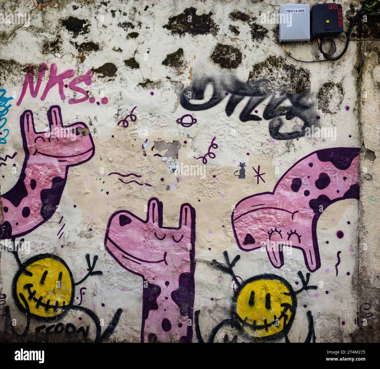 Colourful graffiti on wall in Rua de Miguel Bombarda, in the Bombarda ...