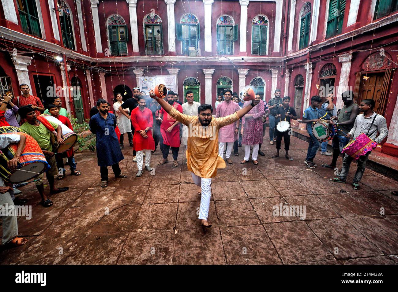 Hindu devotees seen dancing with Dhunachi (Indian incense burner) next ...