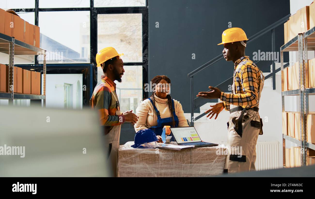 African american people packing products hi-res stock photography and ...