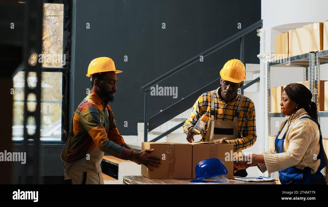 African american people packing products hi-res stock photography and ...
