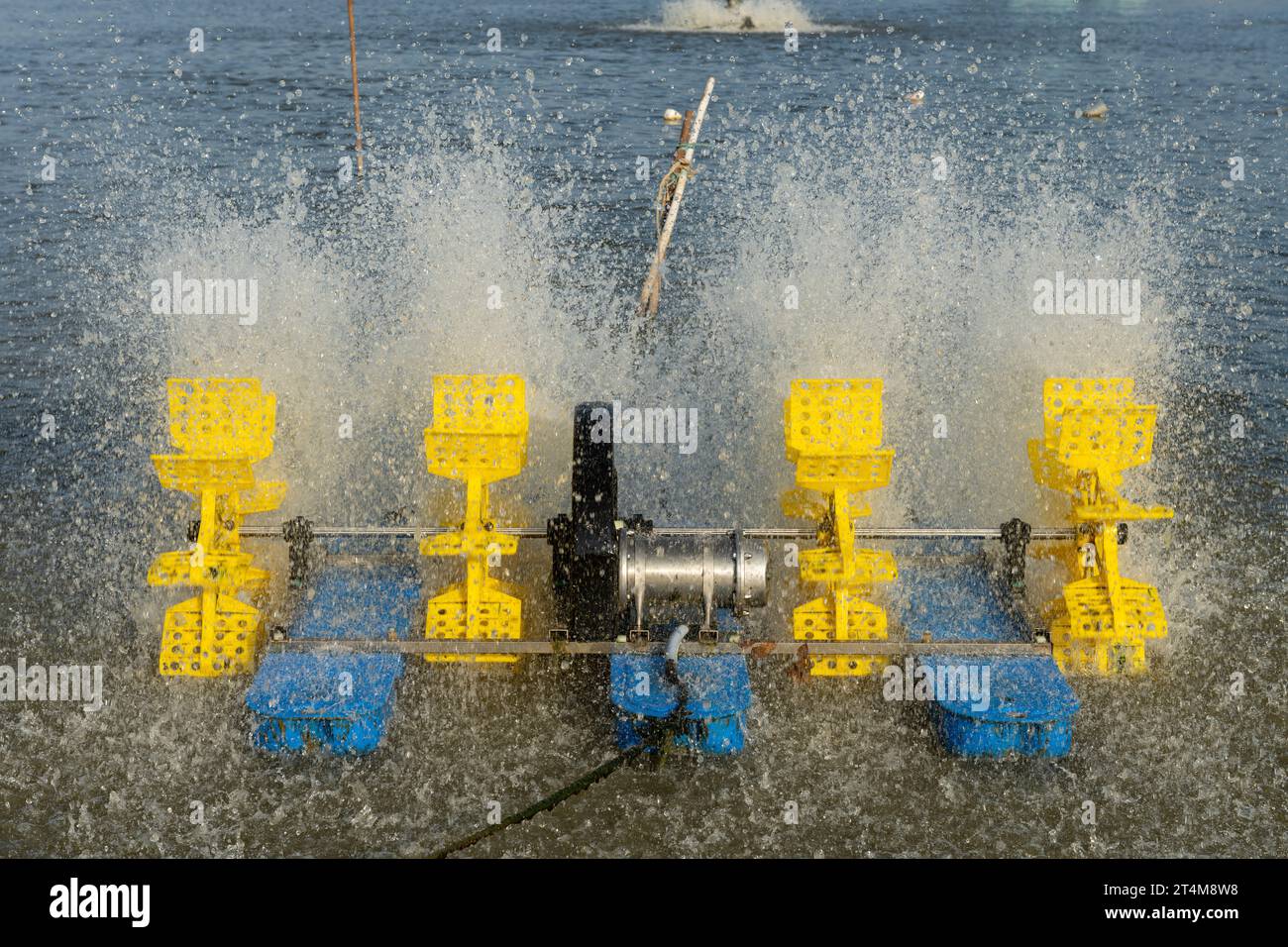 an oxygen-enriching machine running in a fish pond Stock Photo - Alamy