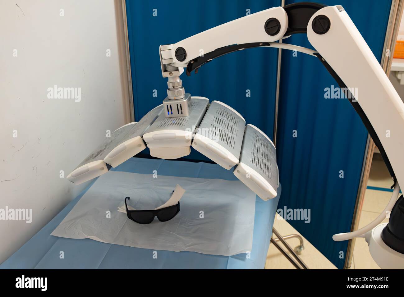 red and blue laser therapy device in a hospital at horizontal ...