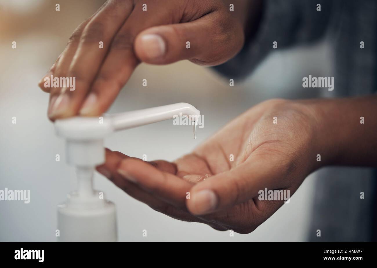 Kill the bacteria, break the cycle. an unrecognisable man disinfecting ...