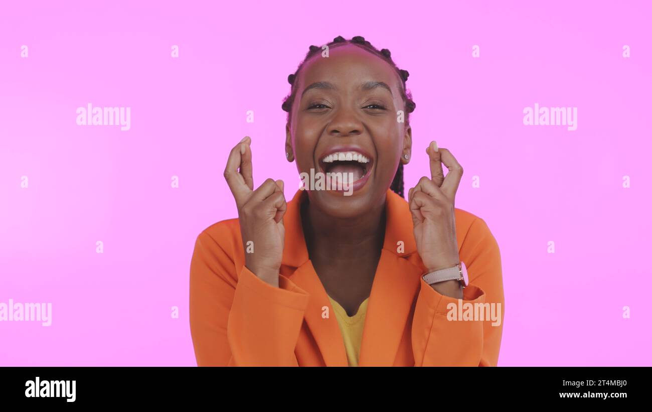 Woman, winner and fingers crossed for happy, excited and face for good ...