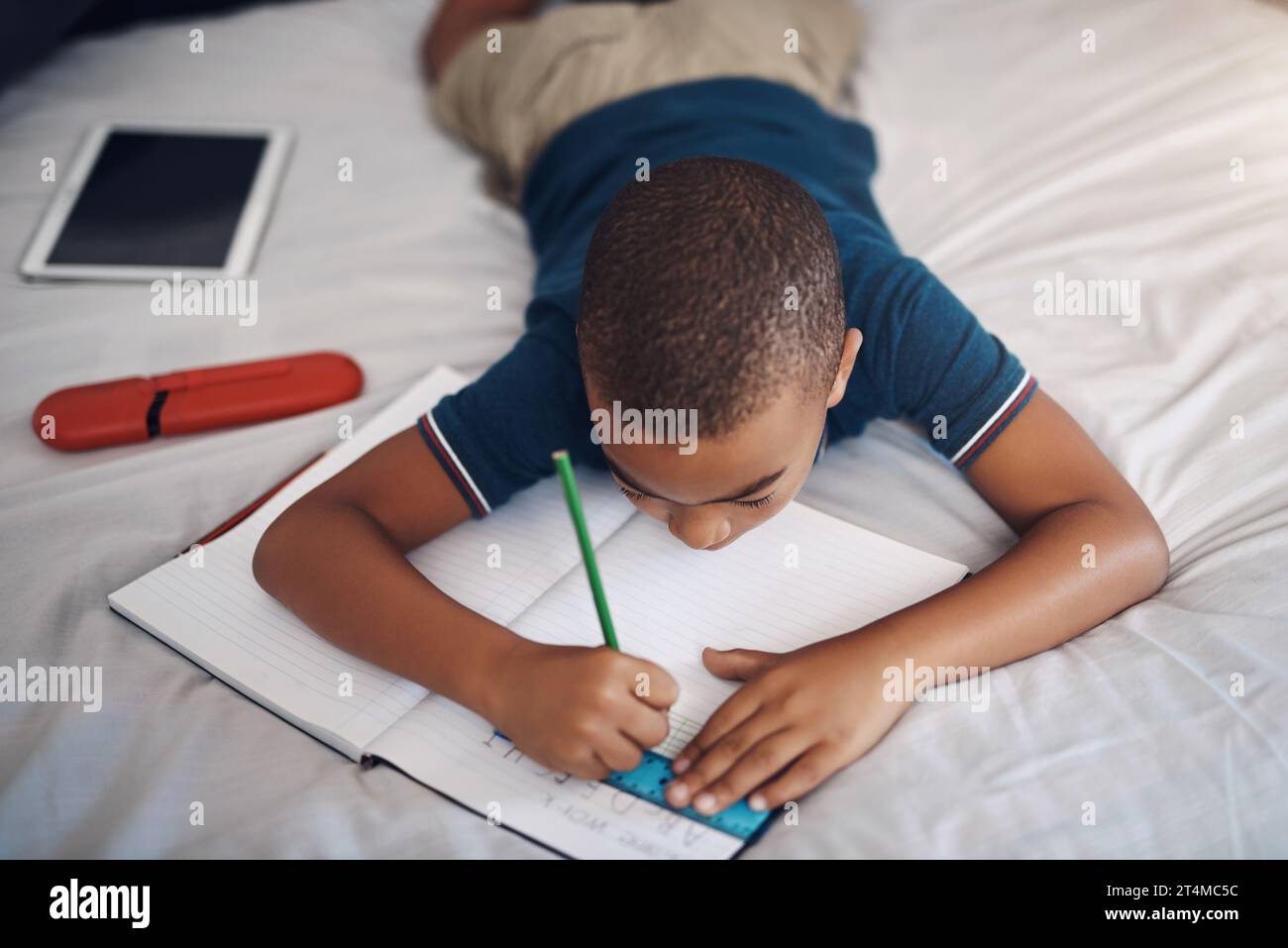 Boys drawing colouring pencils hi-res stock photography and images - Alamy