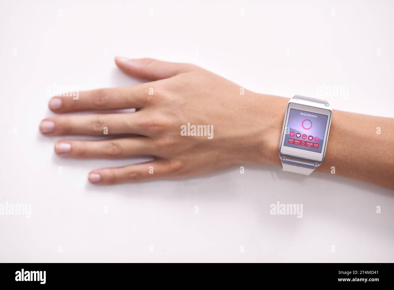 Smart technology. Closeup studio shot of a womans arm wearing a ...