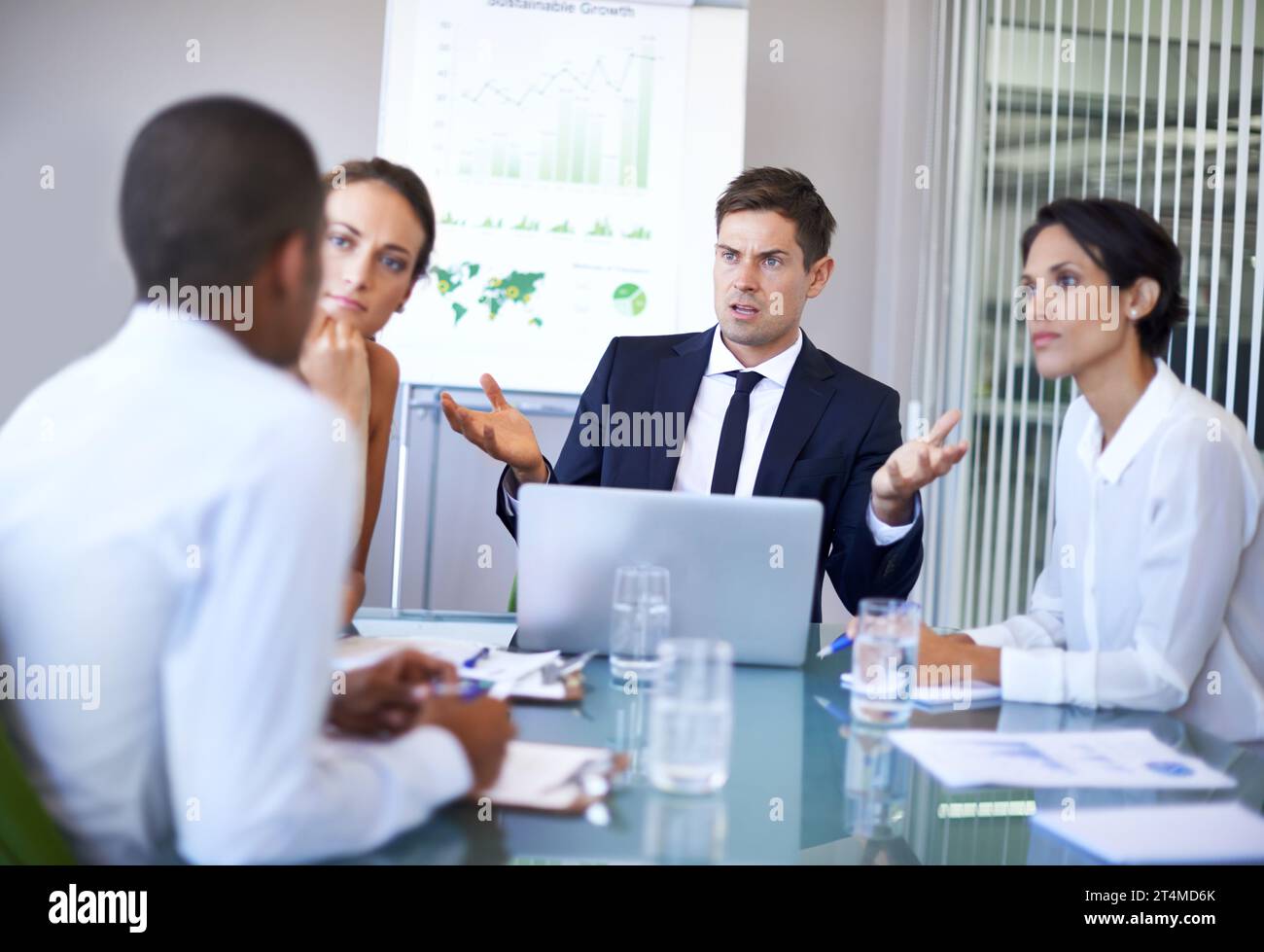 Corporate conundrums. A group of businesspeople having a heated ...