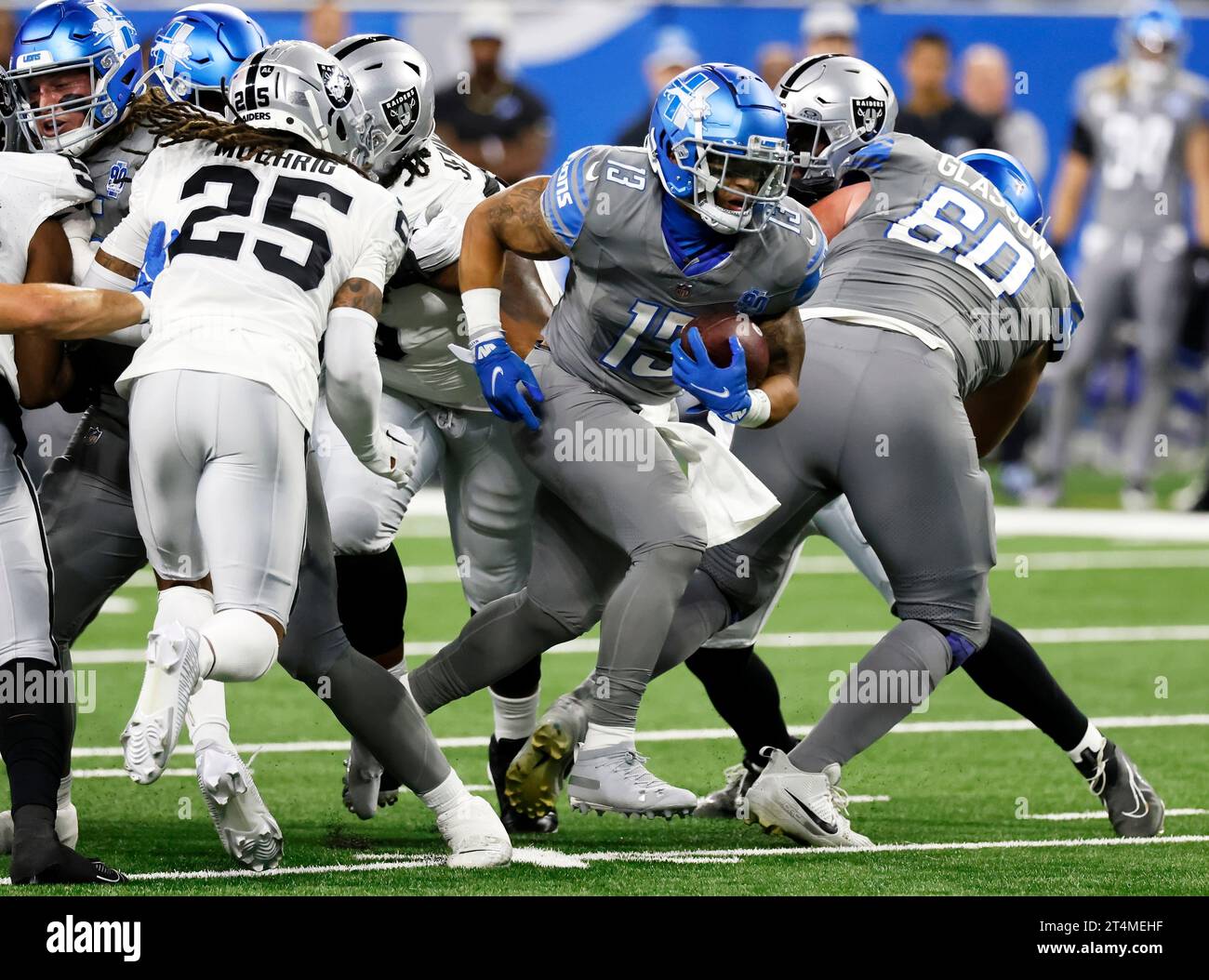 With blocking from Detroit Lions guard Graham Glasgow (60), Detroit ...