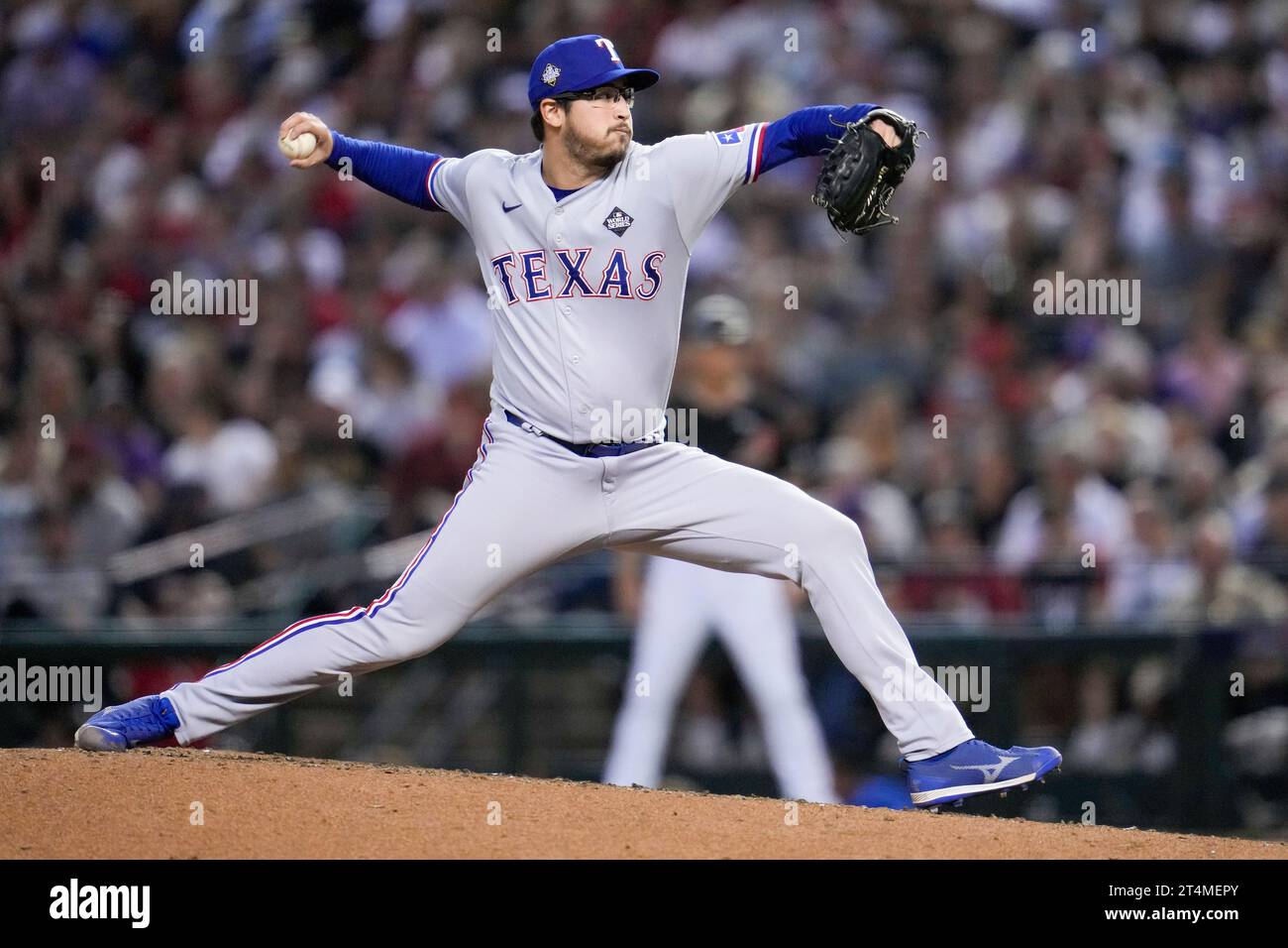 Texas Rangers starting pitcher Dane Dunning throws against the Arizona ...
