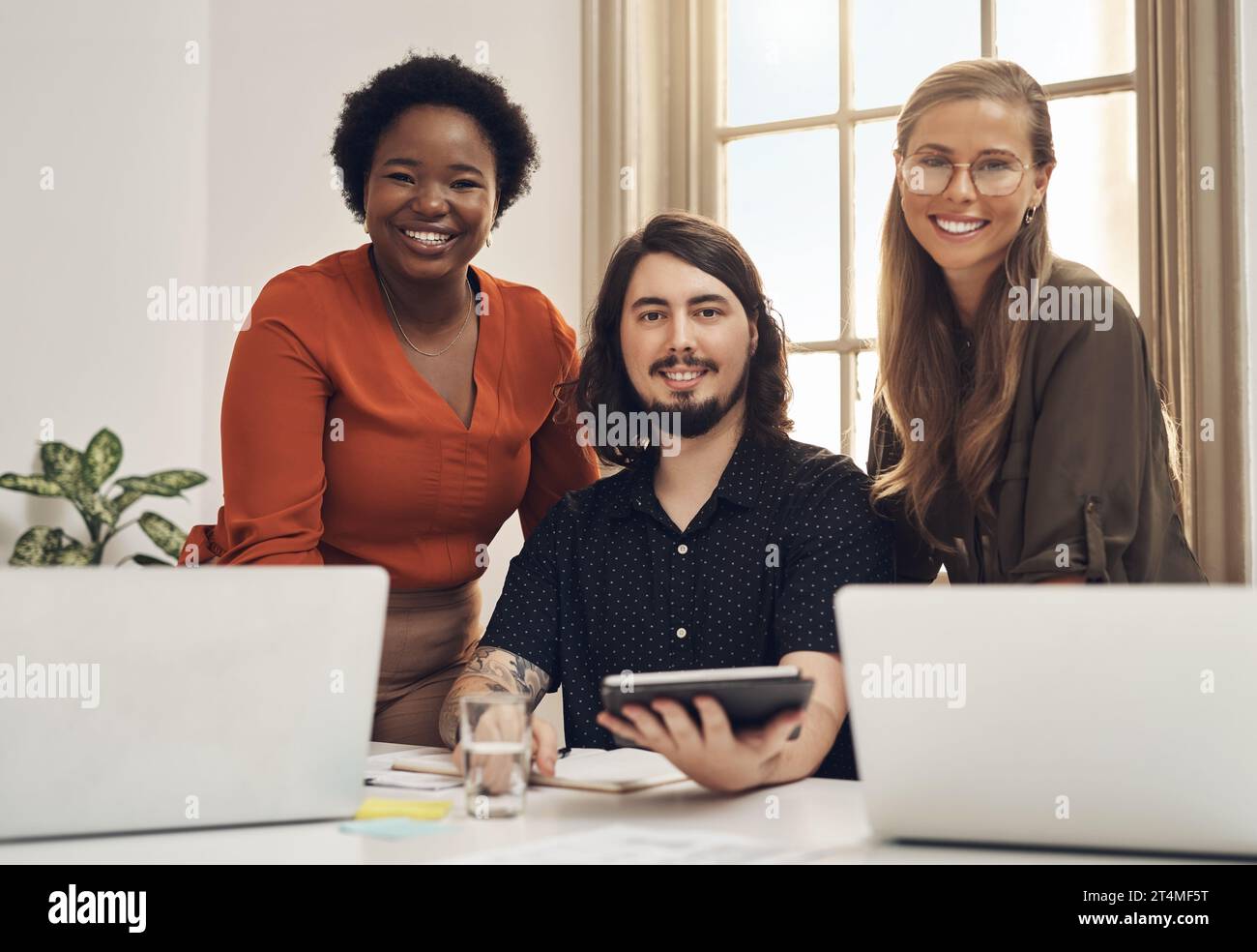 Productivity thrives in a team who understand each other well. Portrait ...