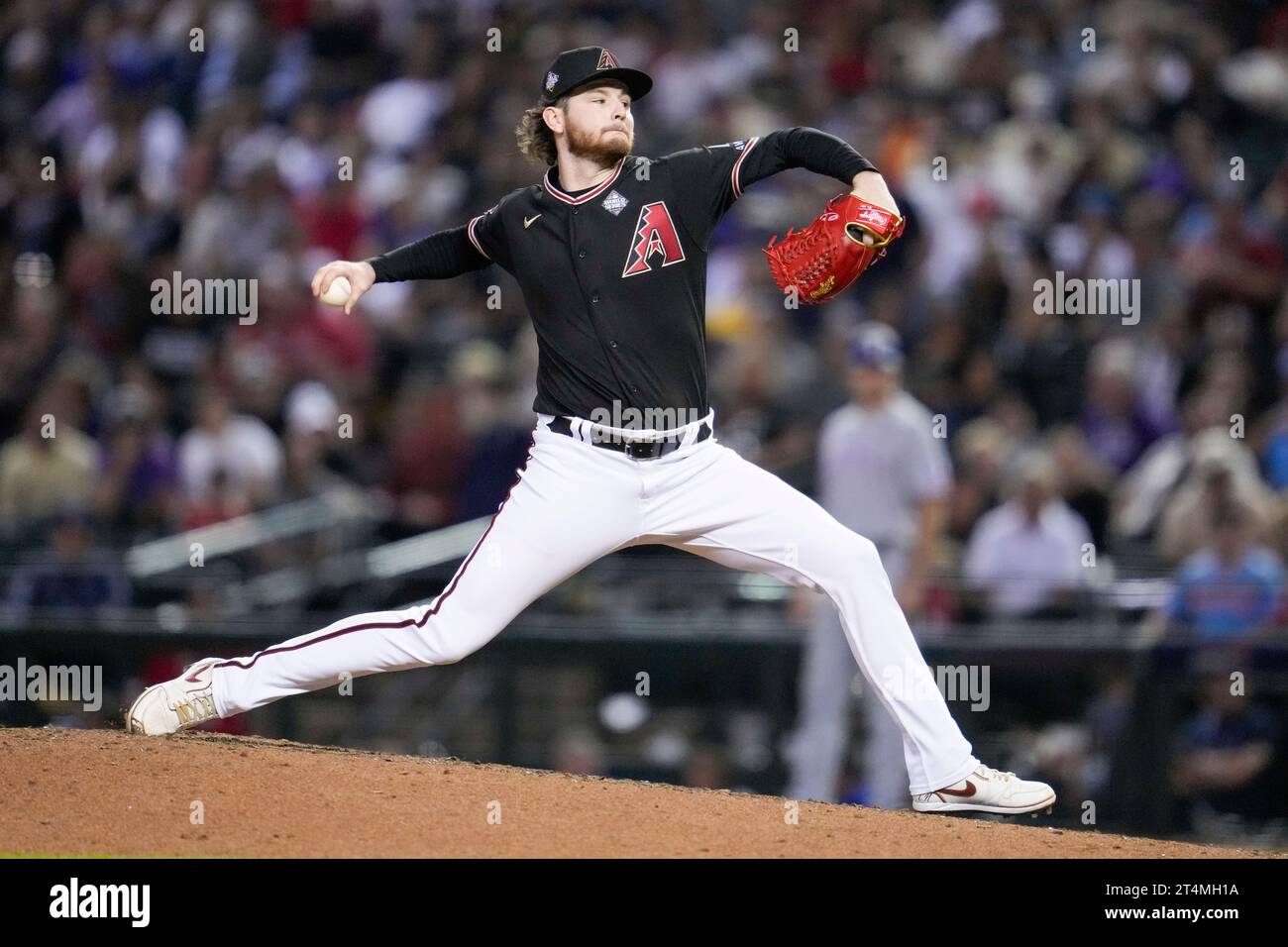 Arizona Diamondbacks pitcher Ryne Nelson throws against the Texas Rangers during the ninth ...