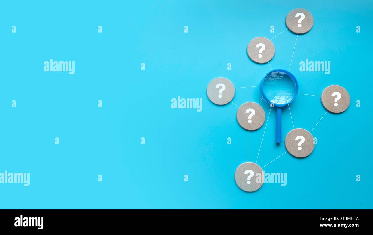 QnA or questions and answers concept. Pink magnifying glass with ...