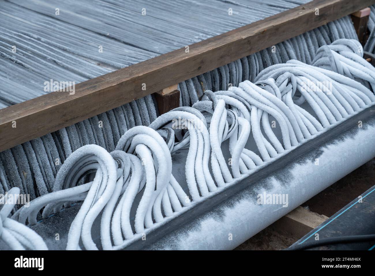 Ice rink cooling system technology : plastic pipes covered with ice for ...
