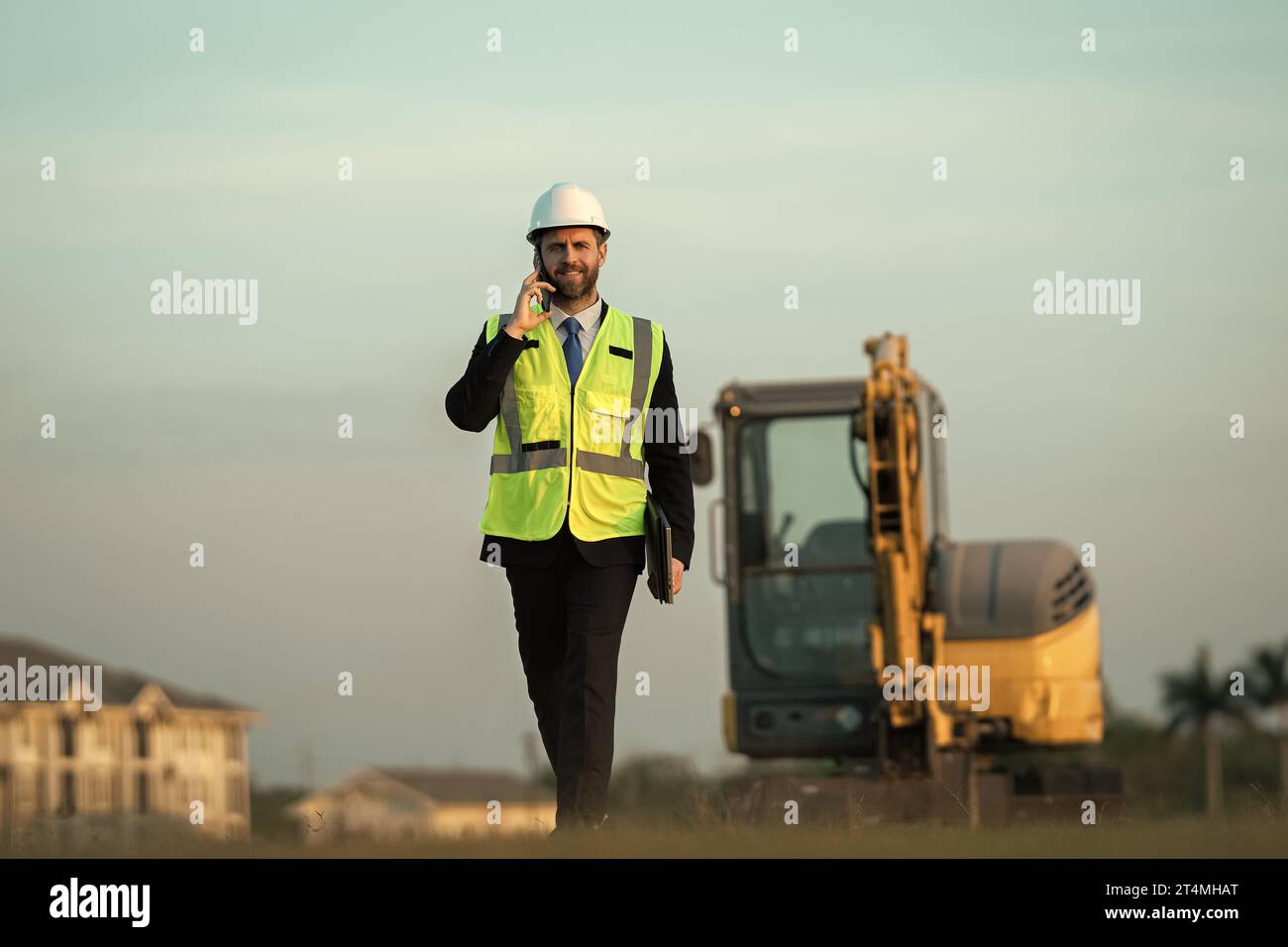 man of architect occupation speaking on phone outdoor. engineer man of ...