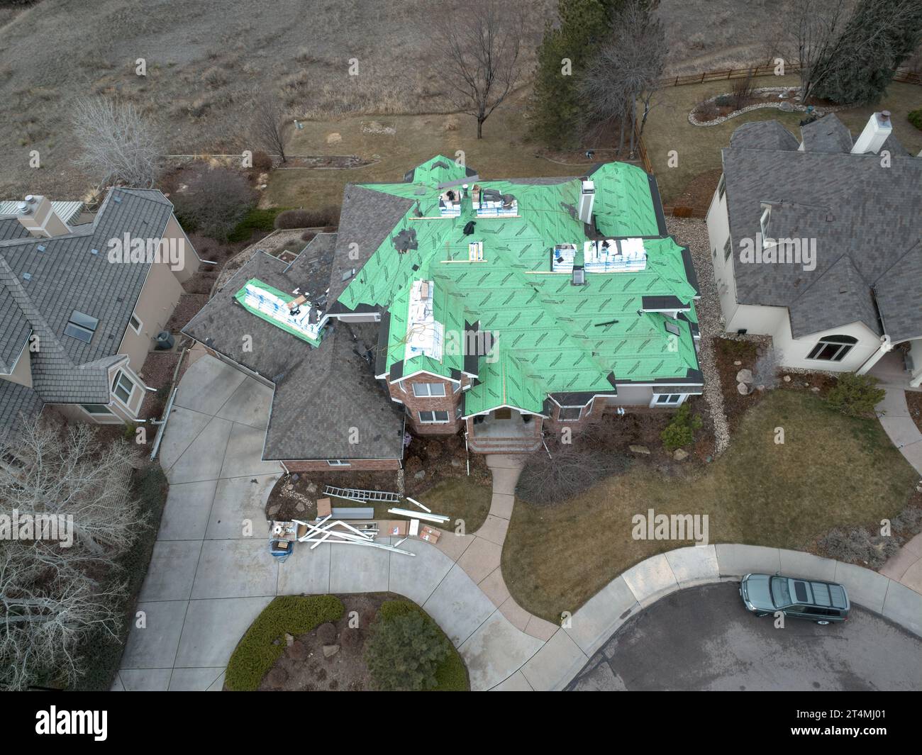 Roofer repairs damage house hi-res stock photography and images - Alamy