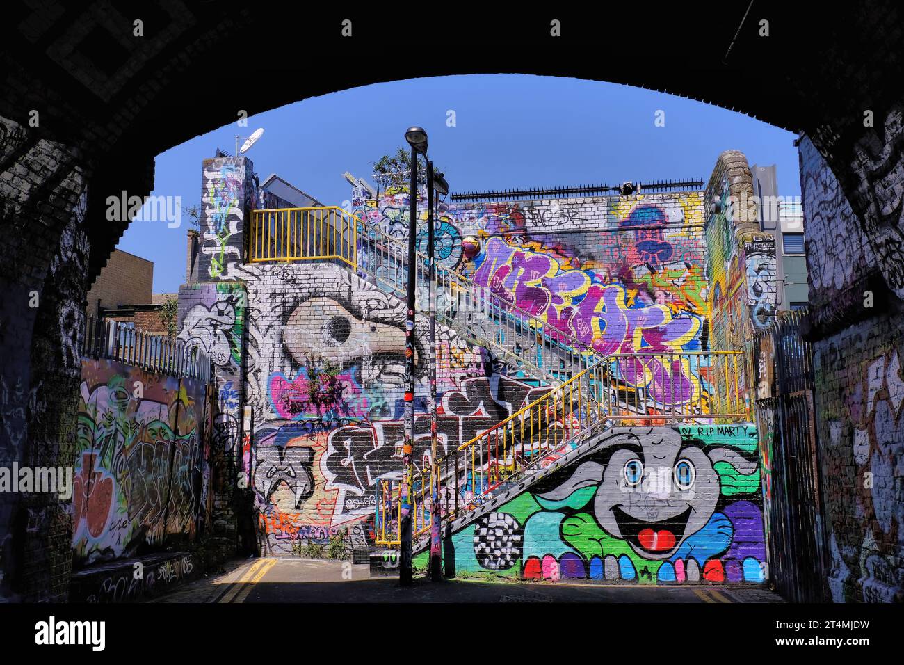 Colourful street art and graffiti in Fleet Street Hill near Brick Lane ...