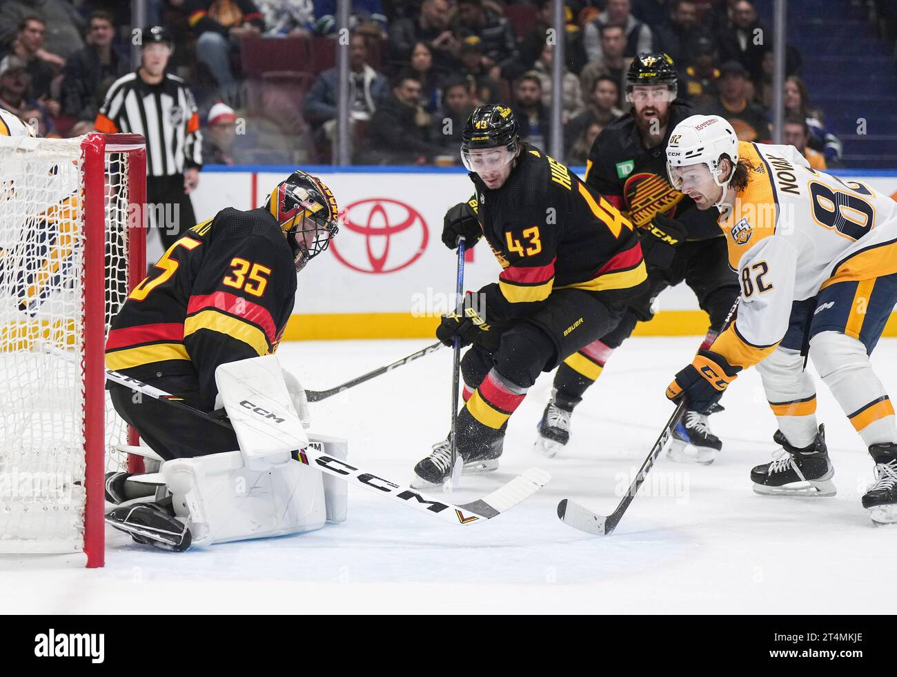 Vancouver Canucks goalie Thatcher Demko (35) stops Nashville Predators ...