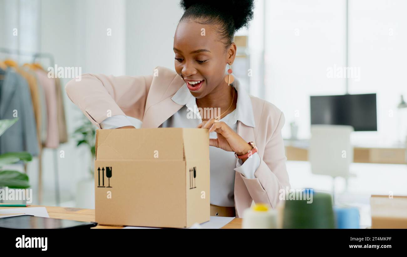 Happy black woman, box and fashion designer in supply chain, small ...