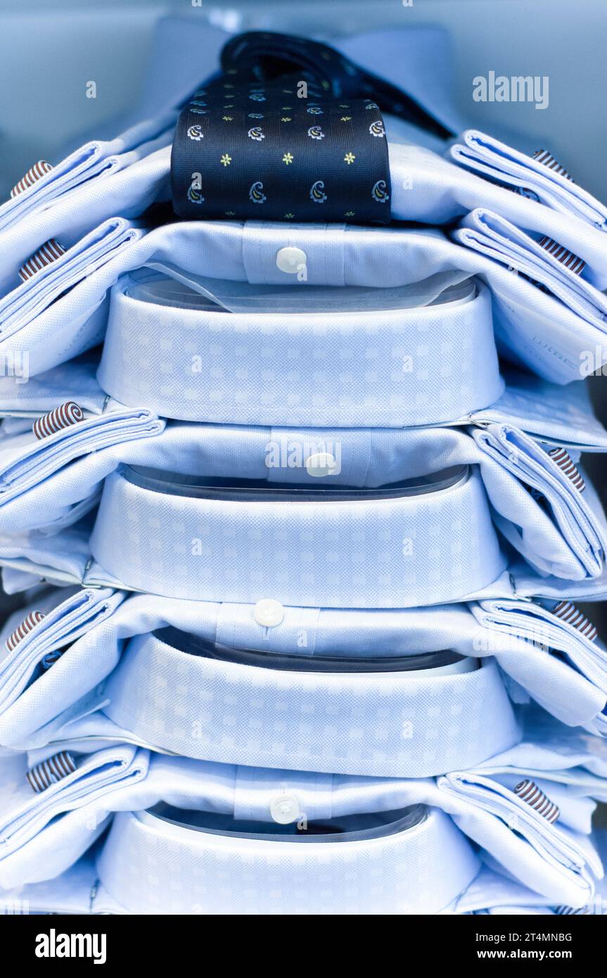 Stack of mens formal business shirts Stock Photo - Alamy