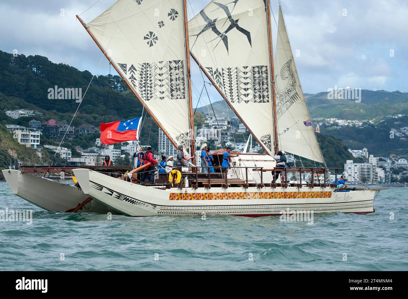 Traditional Samoan double hulled, ocean going canoe Gaualofa sailing on Wellington Harbour Stock ...